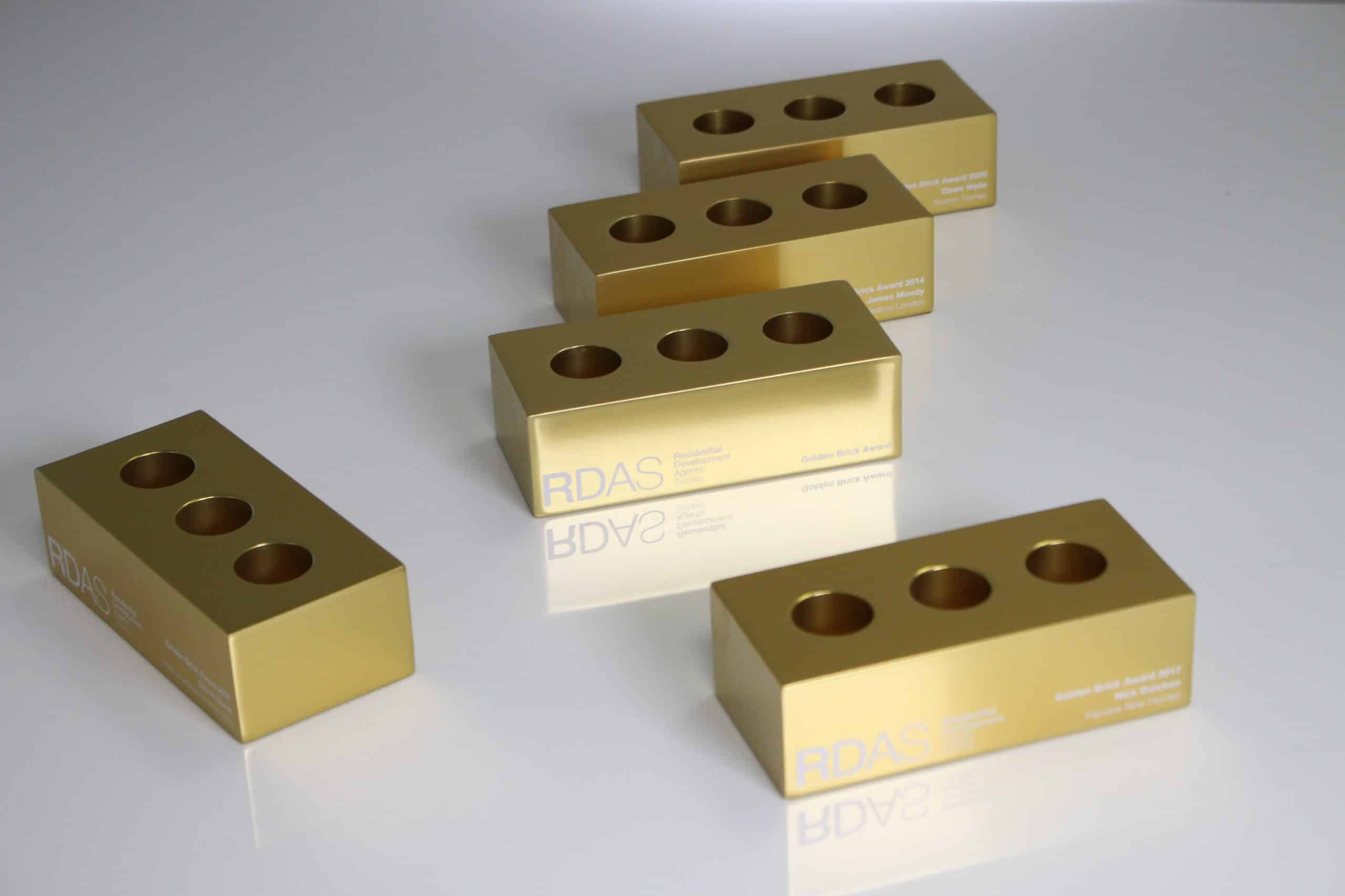 Discover Our Custom Gold Brick Awards Trophy | Gaudio